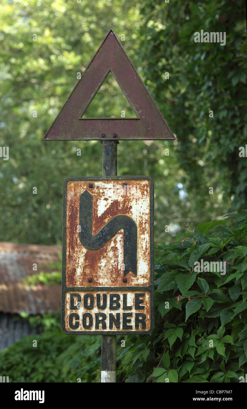 Double bend warning road sign hi-res stock photography and images - Alamy