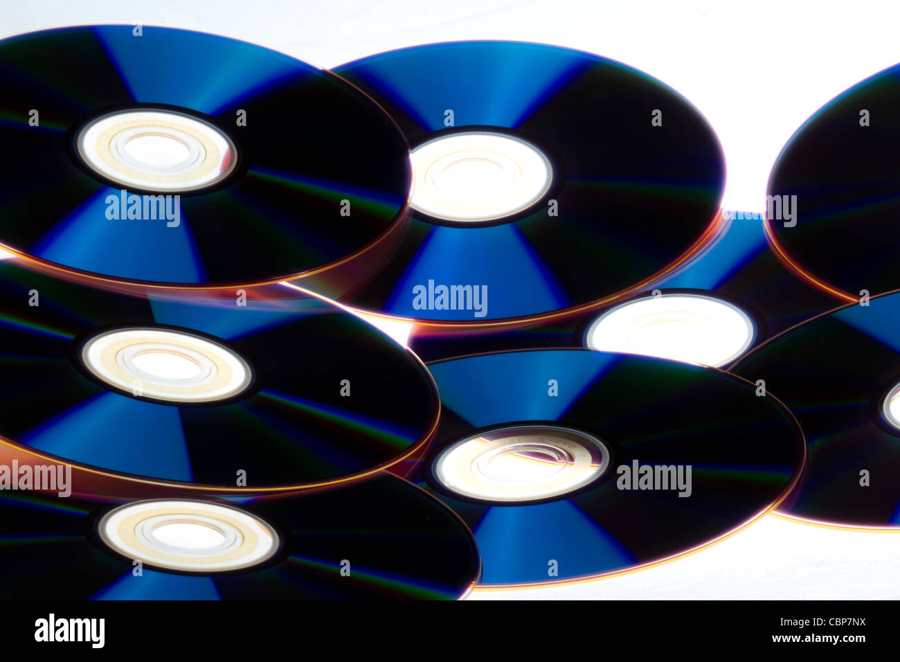 Many CDs on a stack giving a blue color Stock Photo - Alamy