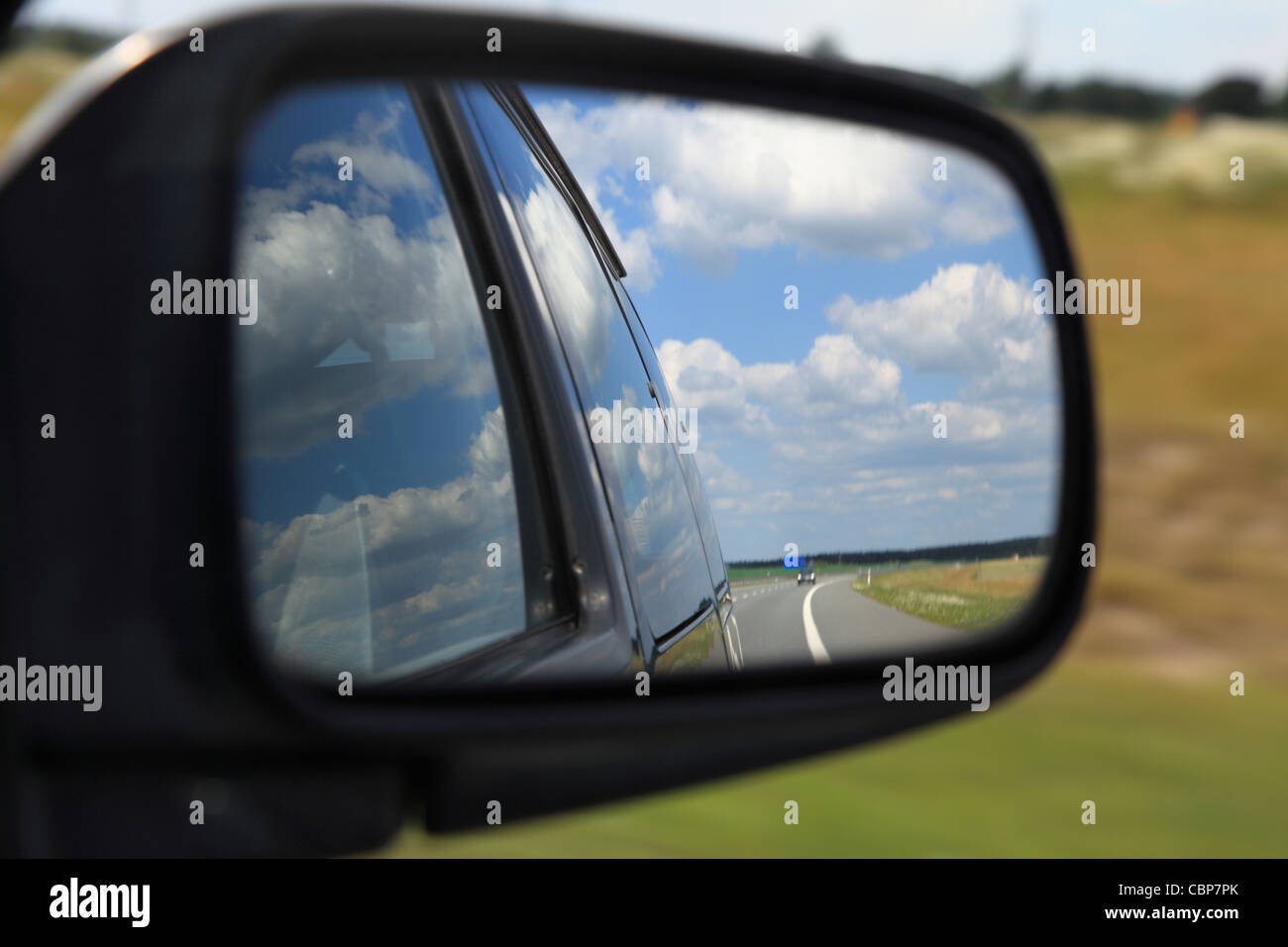 Road reflecting in the sideview mirror of a car Stock Photo - Alamy