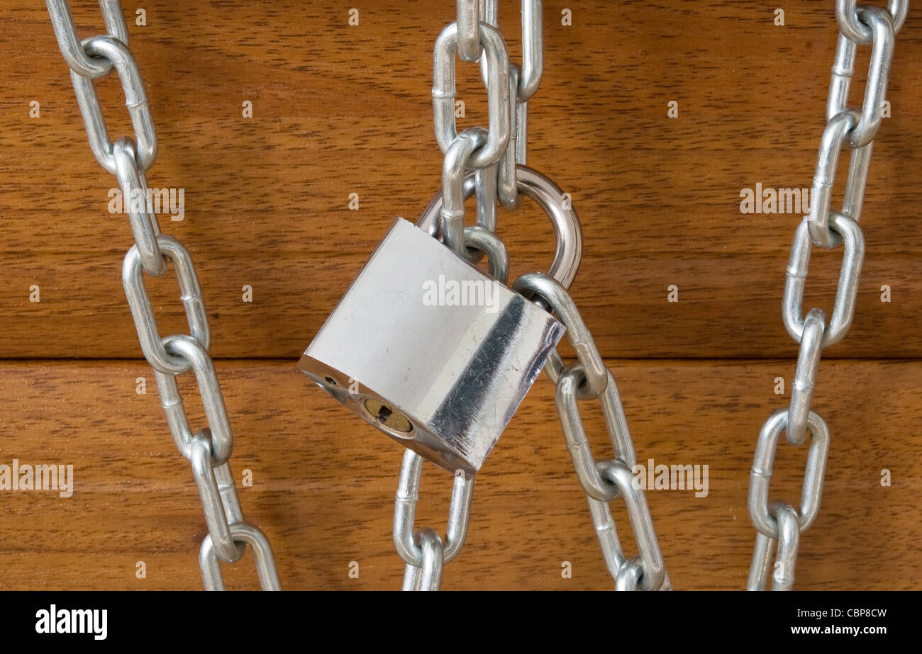 wooden gate locked in chains Stock Photo - Alamy
