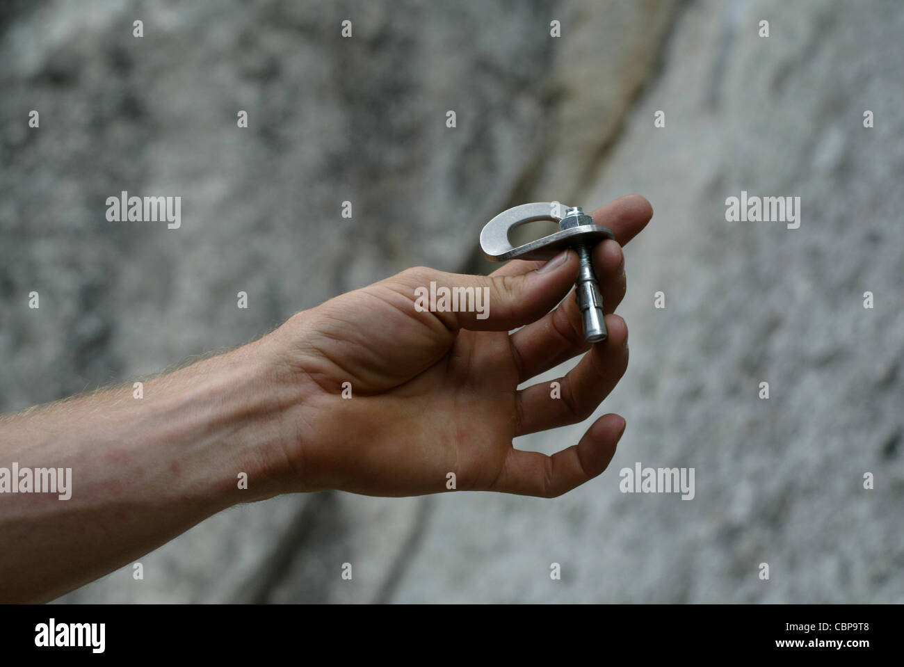 Yosemite Park Climbing Ranger Lincoln Else shows a climbing chock ...