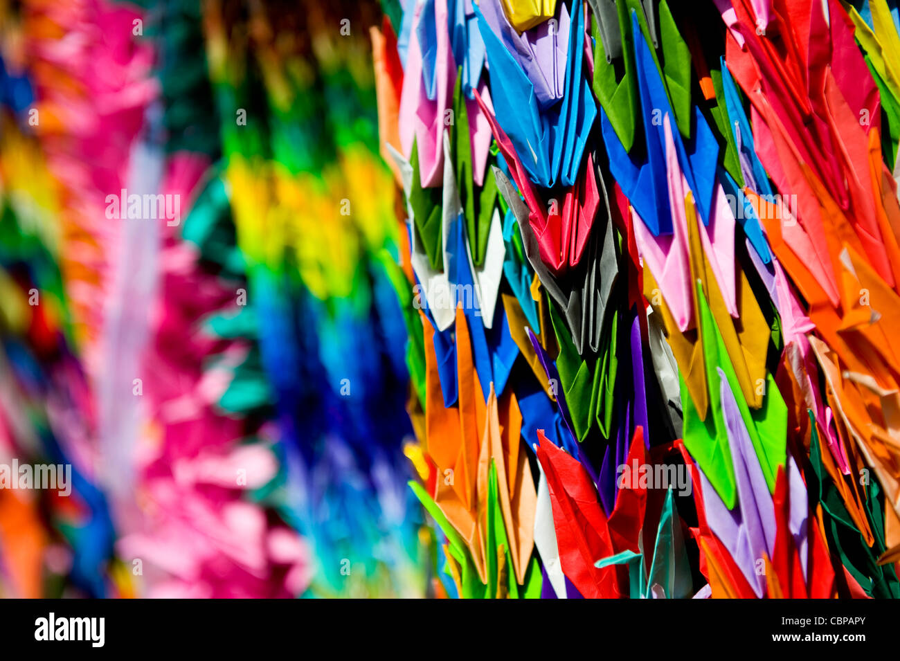 Colourful paper cranes symbolising peace and commemorating the atomic ...