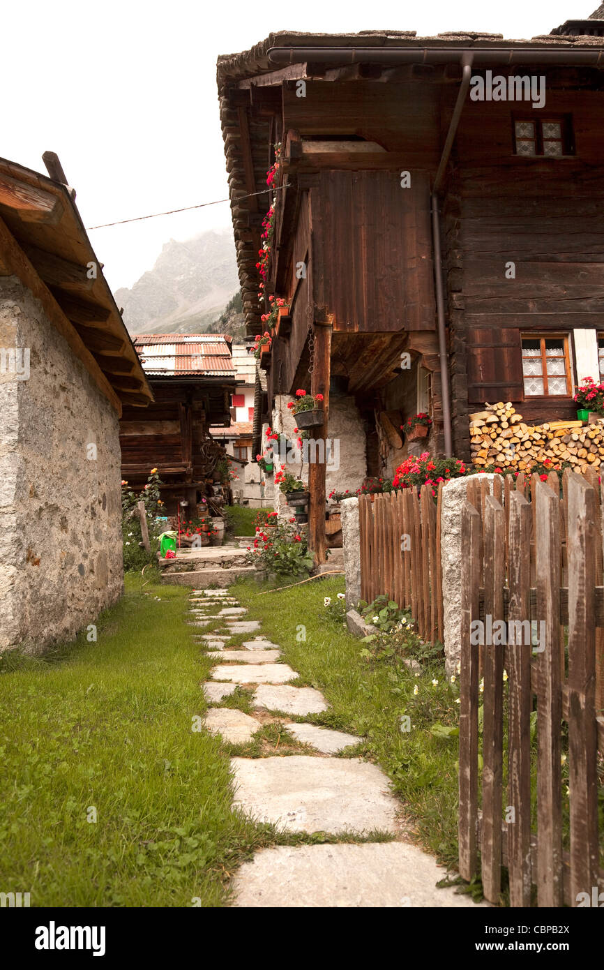 Footpath to Alpine houses in Village of Pecetto near Macugnaga ...