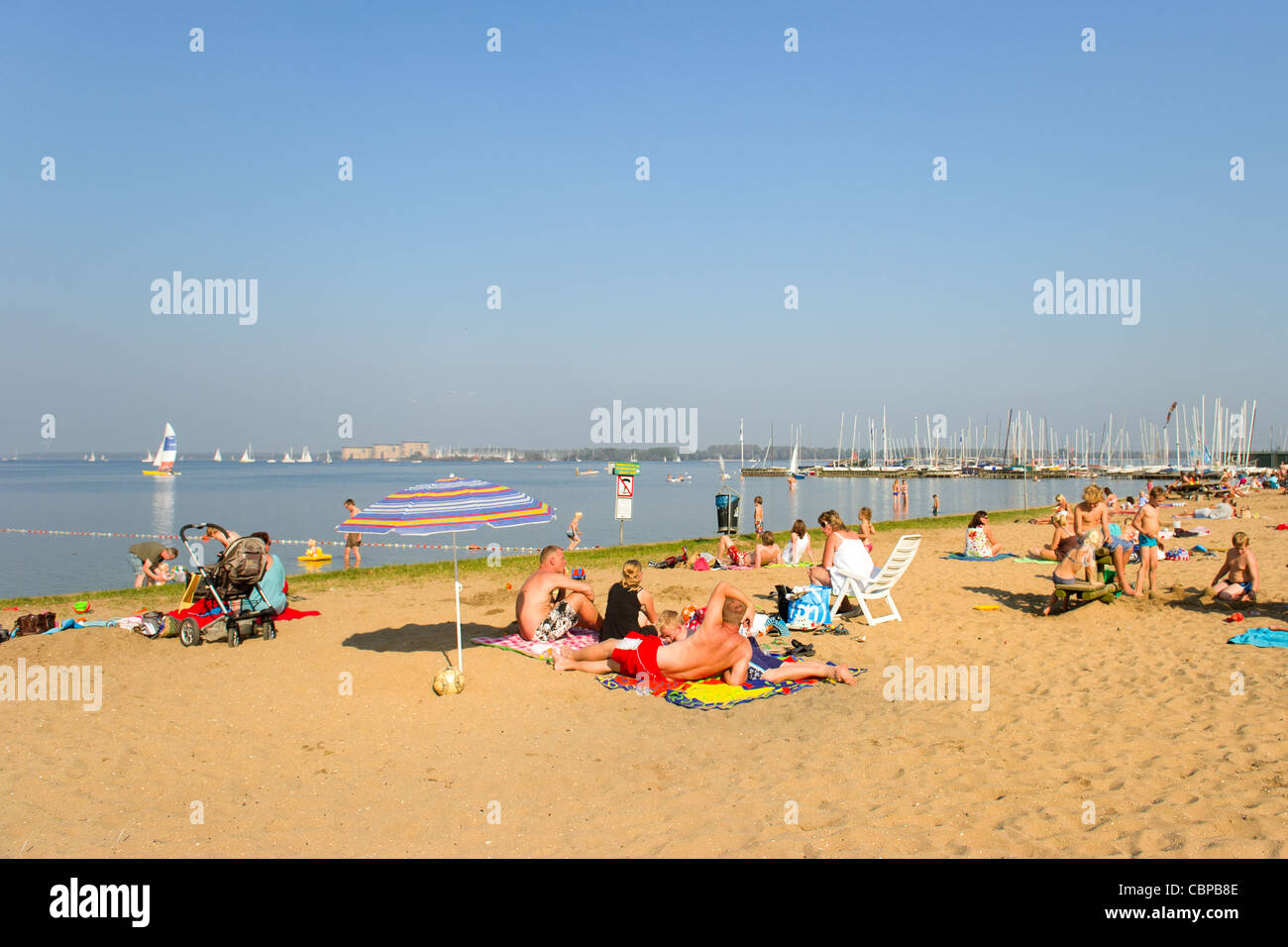 People at the dutch beach Stock Photo - Alamy