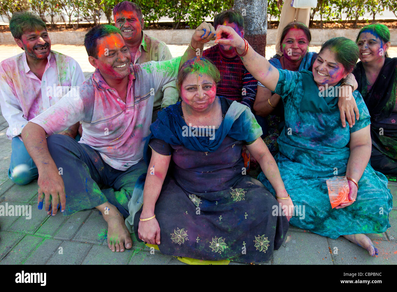 Indian people mark Hindu Holi festival of colours with powder paints in ...