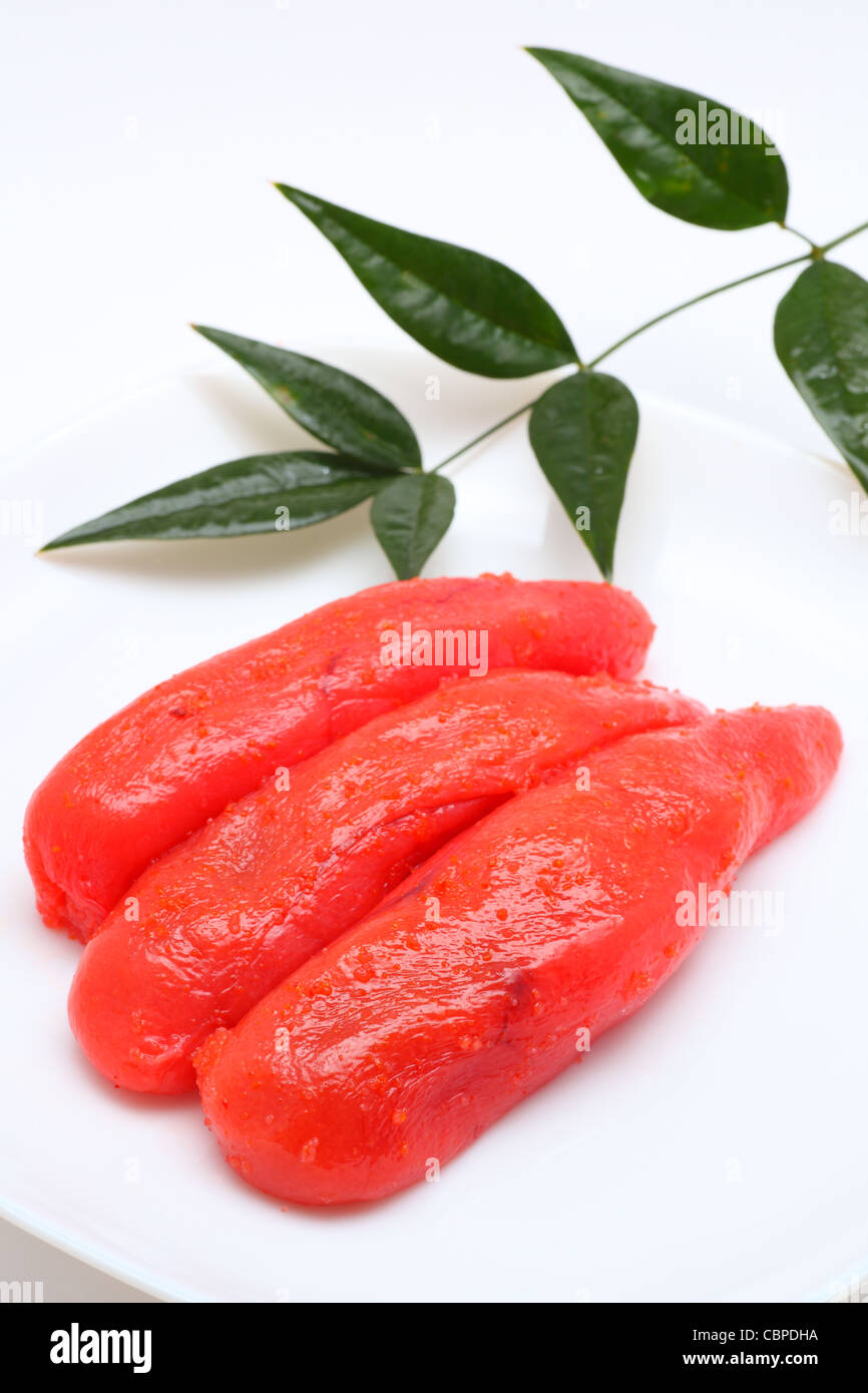 Marinating tarako in hot pepper sauce, japanese food Stock Photo - Alamy