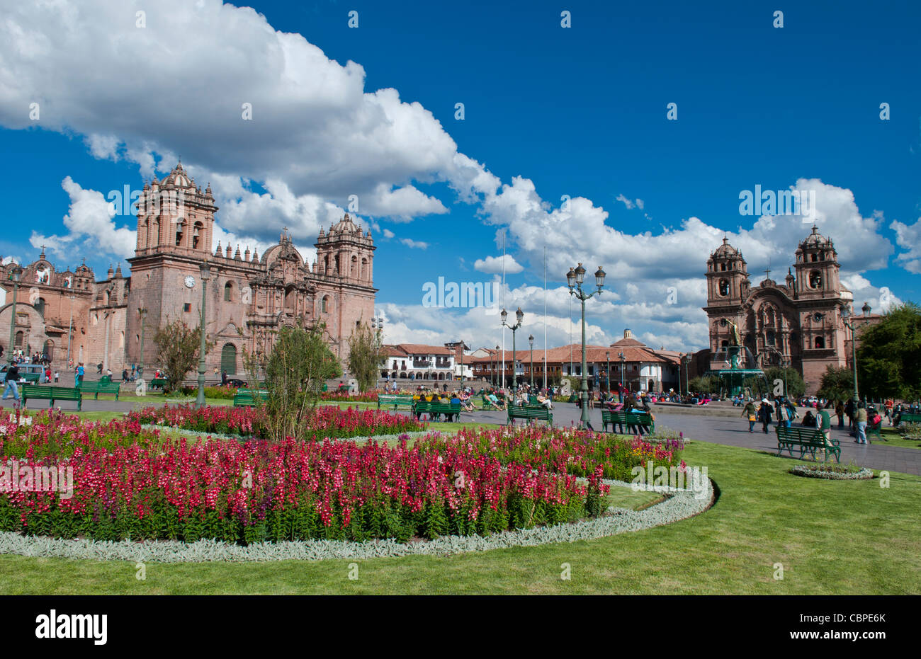 Beautiful visual image of Main Square thru flowers in sunshine of Cusco ...