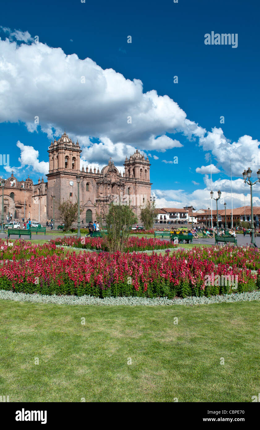 Beautiful visual image of Main Square thru flowers in sunshine of Cusco ...