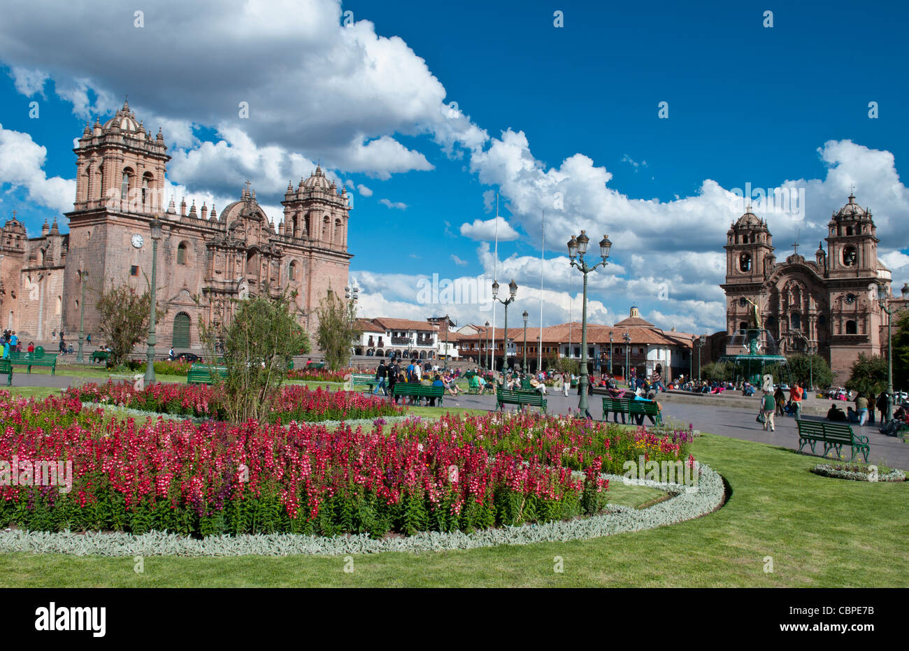 Beautiful visual image of Main Square thru flowers in sunshine of Cusco ...