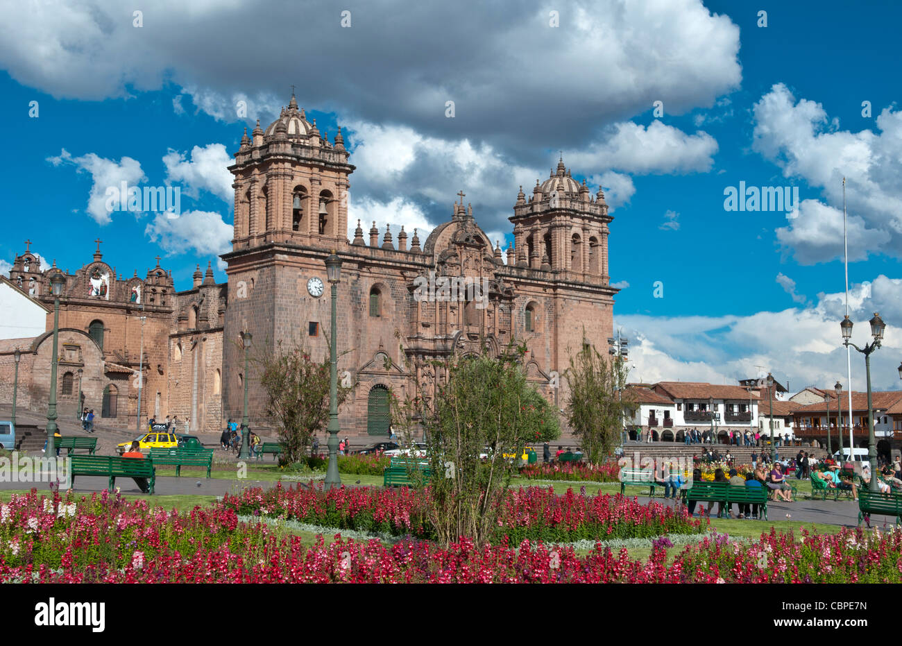 Beautiful visual image of Main Square thru flowers in sunshine of Cusco ...