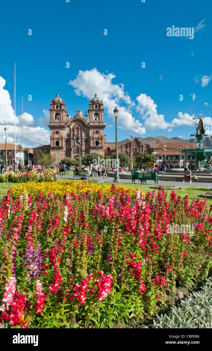 Beautiful visual image of Main Square thru flowers in sunshine of Cusco ...
