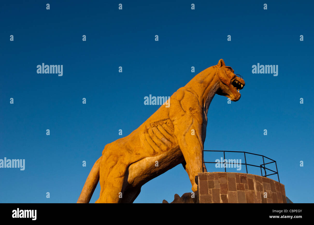 Mountain lion Puma artwork on top of hill in Puno on Lake Titicaca Peru ...