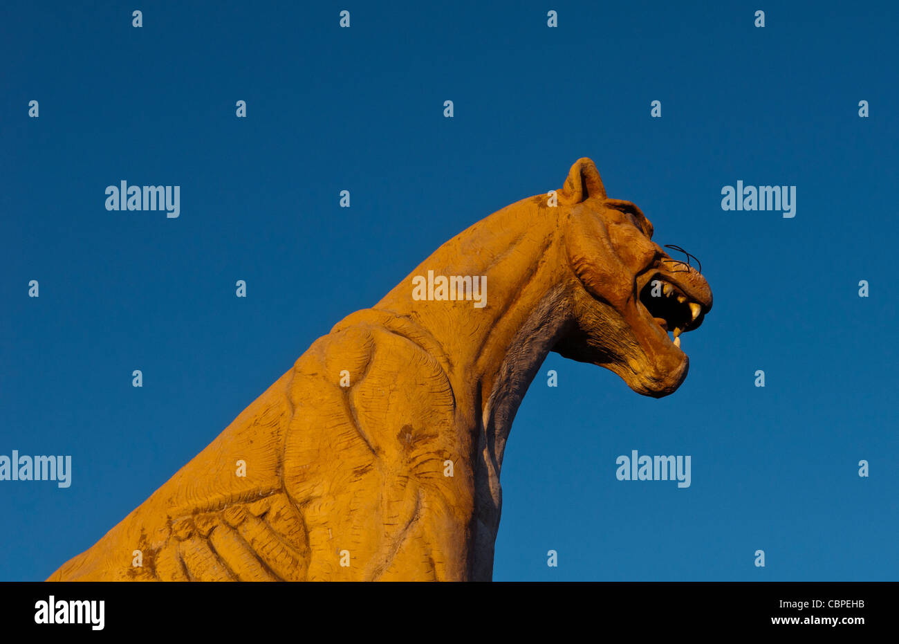Mountain lion Puma artwork on top of hill in Puno on Lake Titicaca Peru ...
