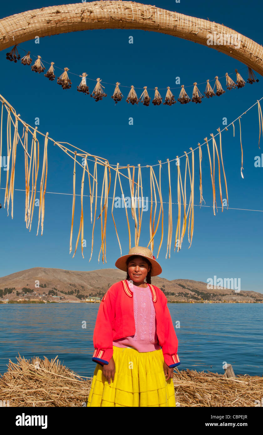 Lake Titicaca Peru with local traditional woman of Uros Tribe history ...