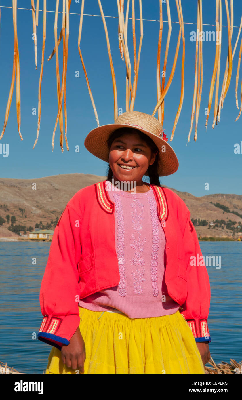 Lake Titicaca Peru with local traditional woman of Uros Tribe history ...