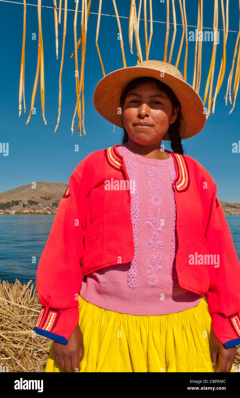 Lake Titicaca Peru with local traditional woman of Uros Tribe history ...
