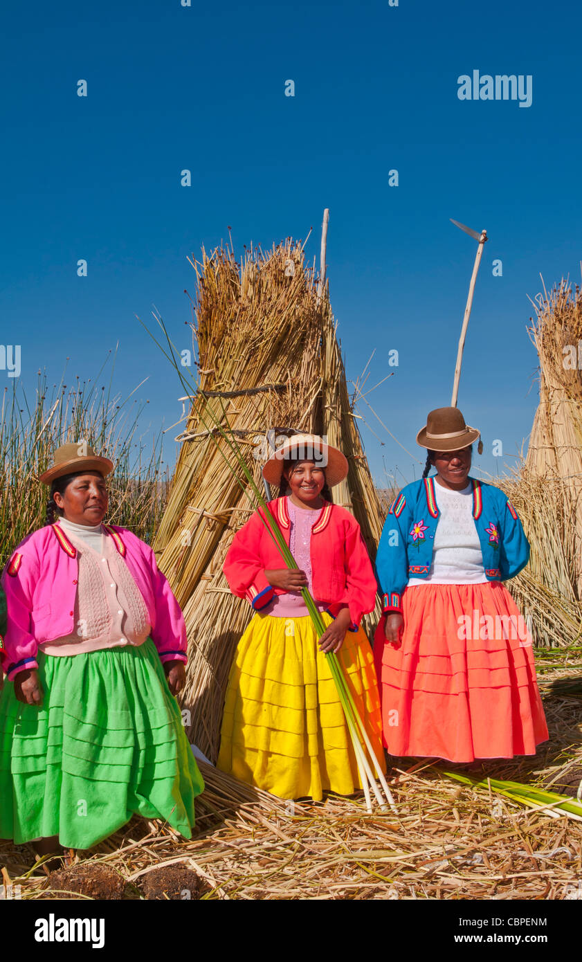 Lake Titicaca Peru with local traditional women of Uros Tribe history ...