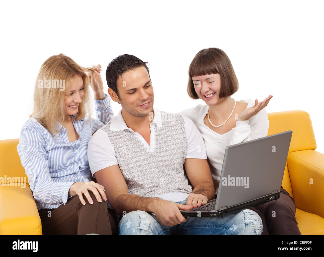 Three happy young adult people sitting with laptop computer on bright ...