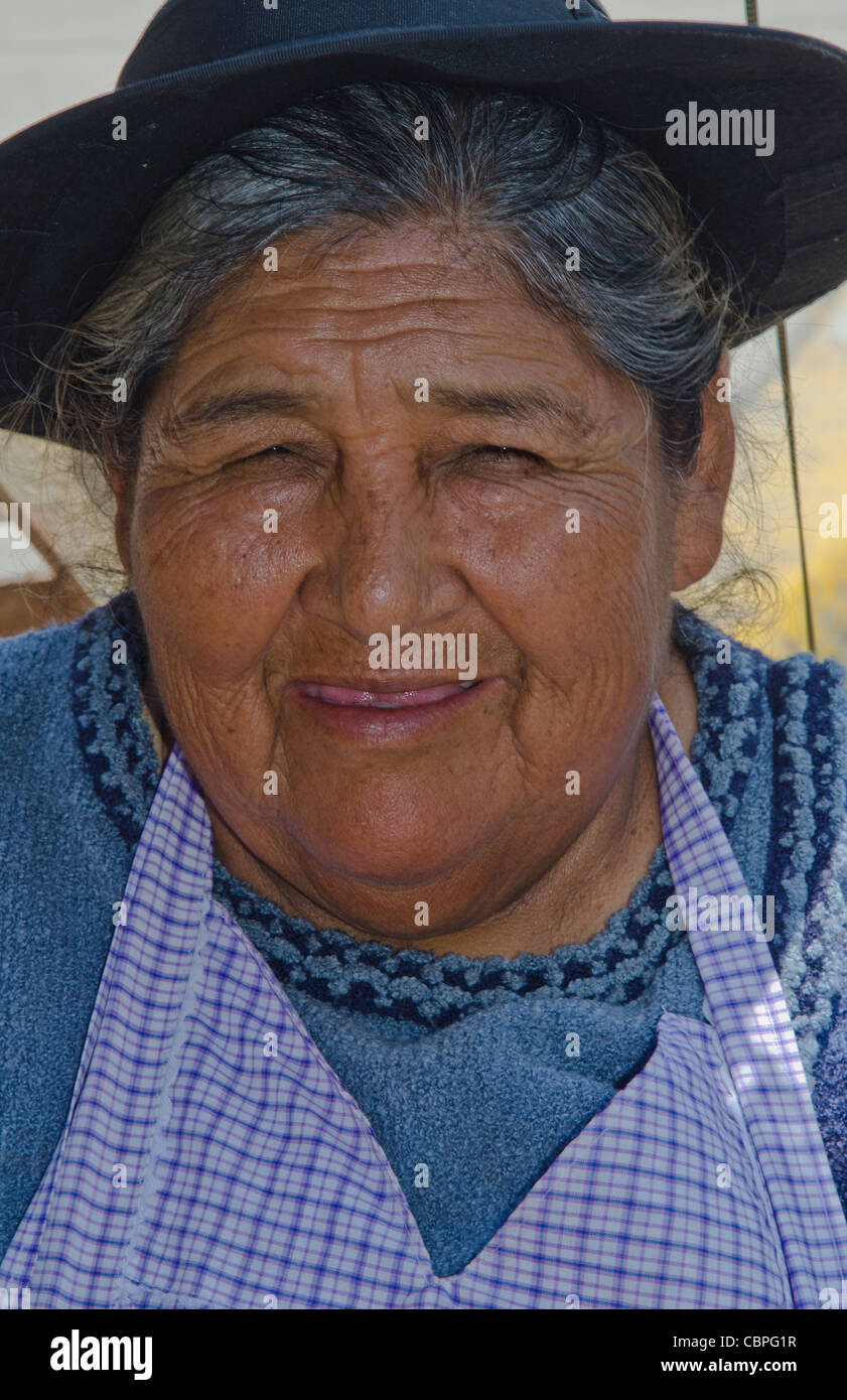 Older woman in hat in traditional dress in Lima Peru Stock Photo - Alamy