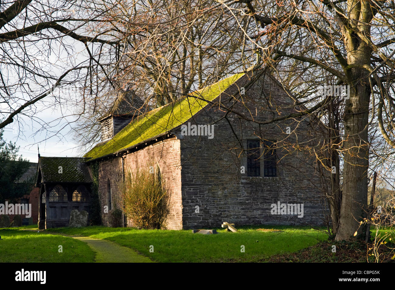Exterior of the rural 12th Century church St Mary Magdalene in village ...