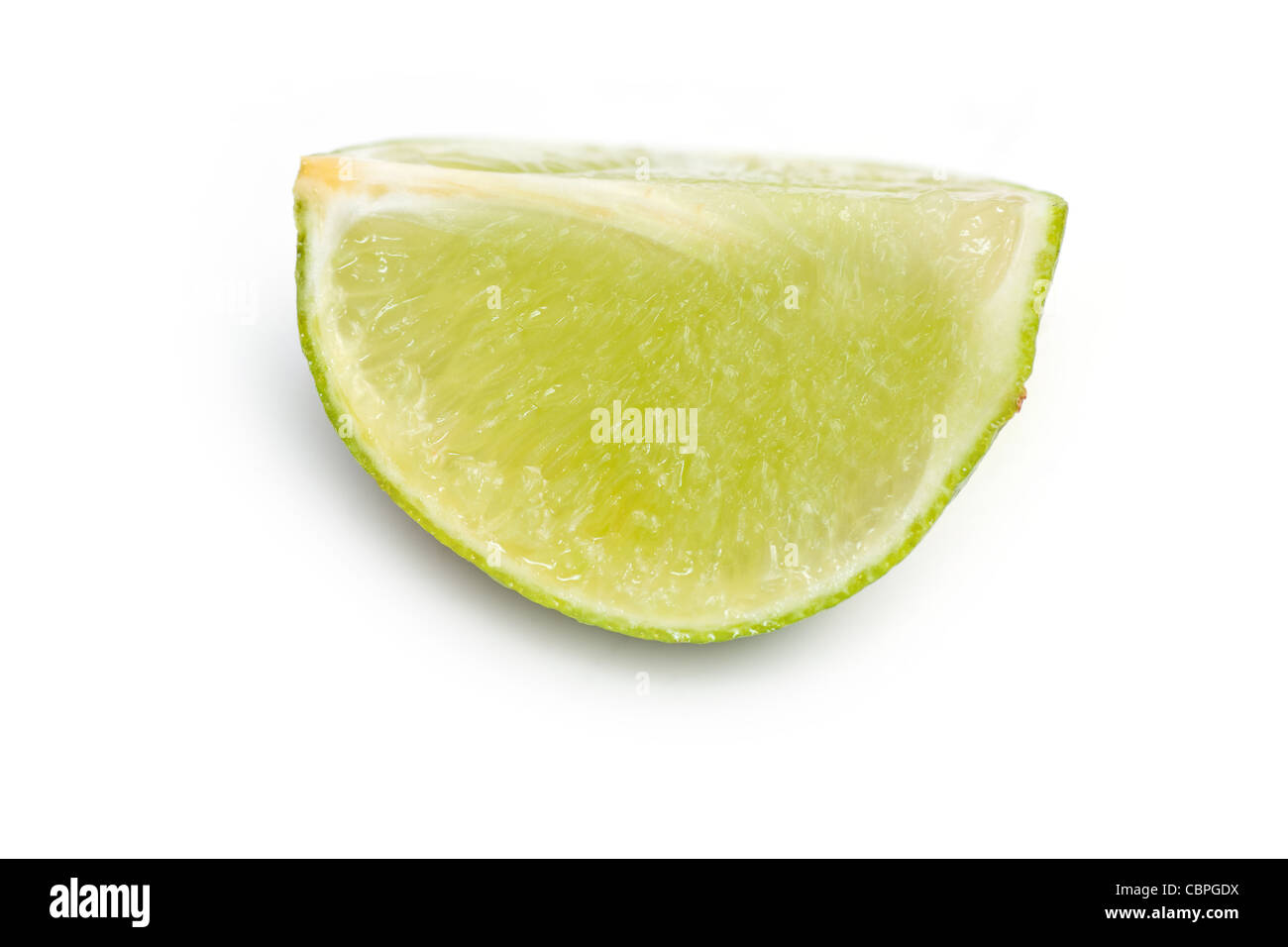Slice of lime fruit Stock Photo - Alamy