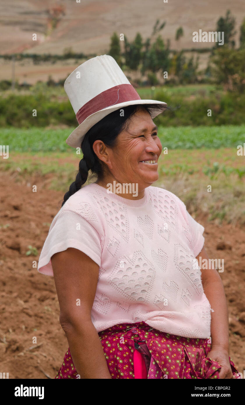 Farming images of traditional woman working with oxen on farm in small ...