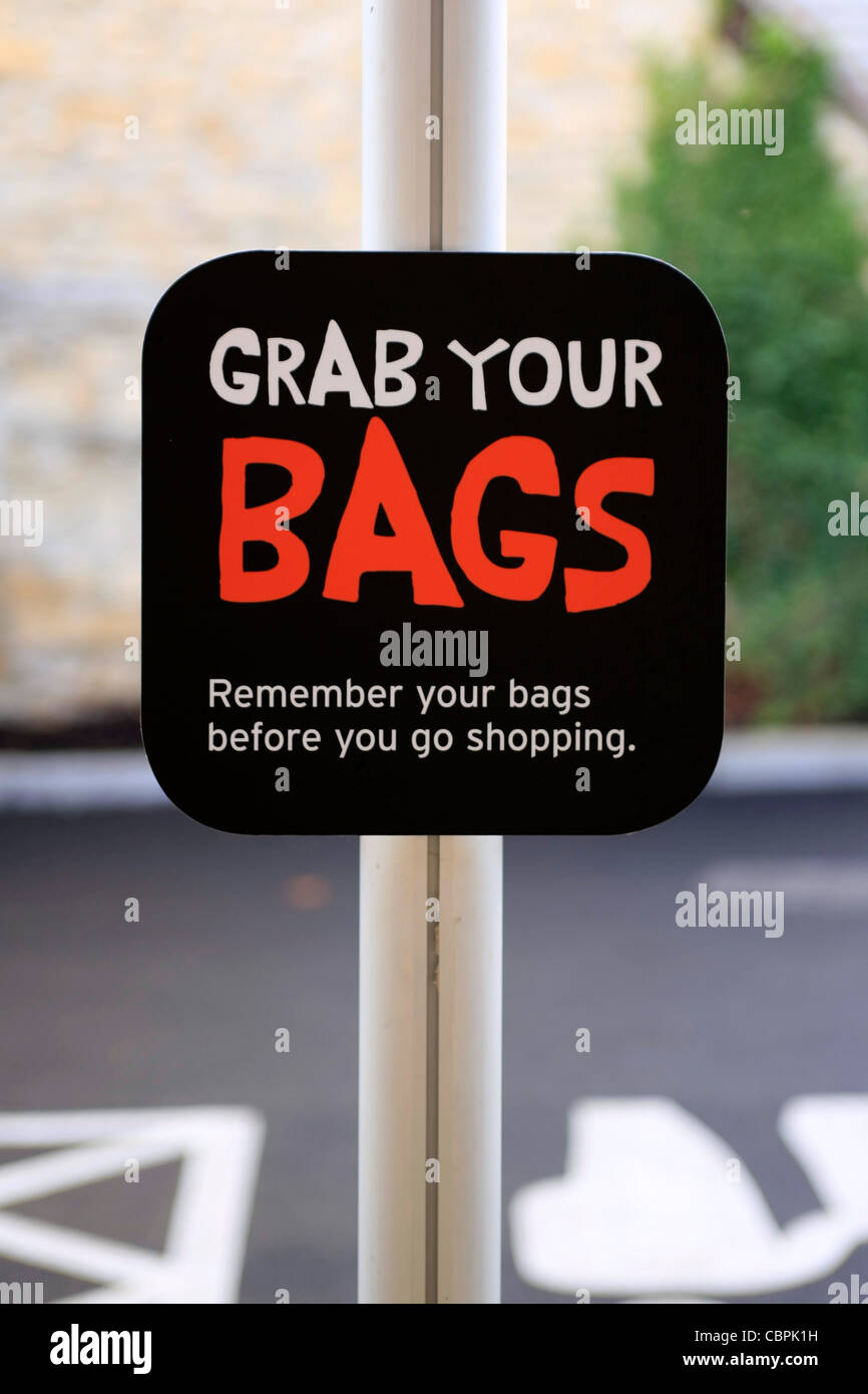 Grab Your Bags Sign outside a supermarket Store to promote recycling ...