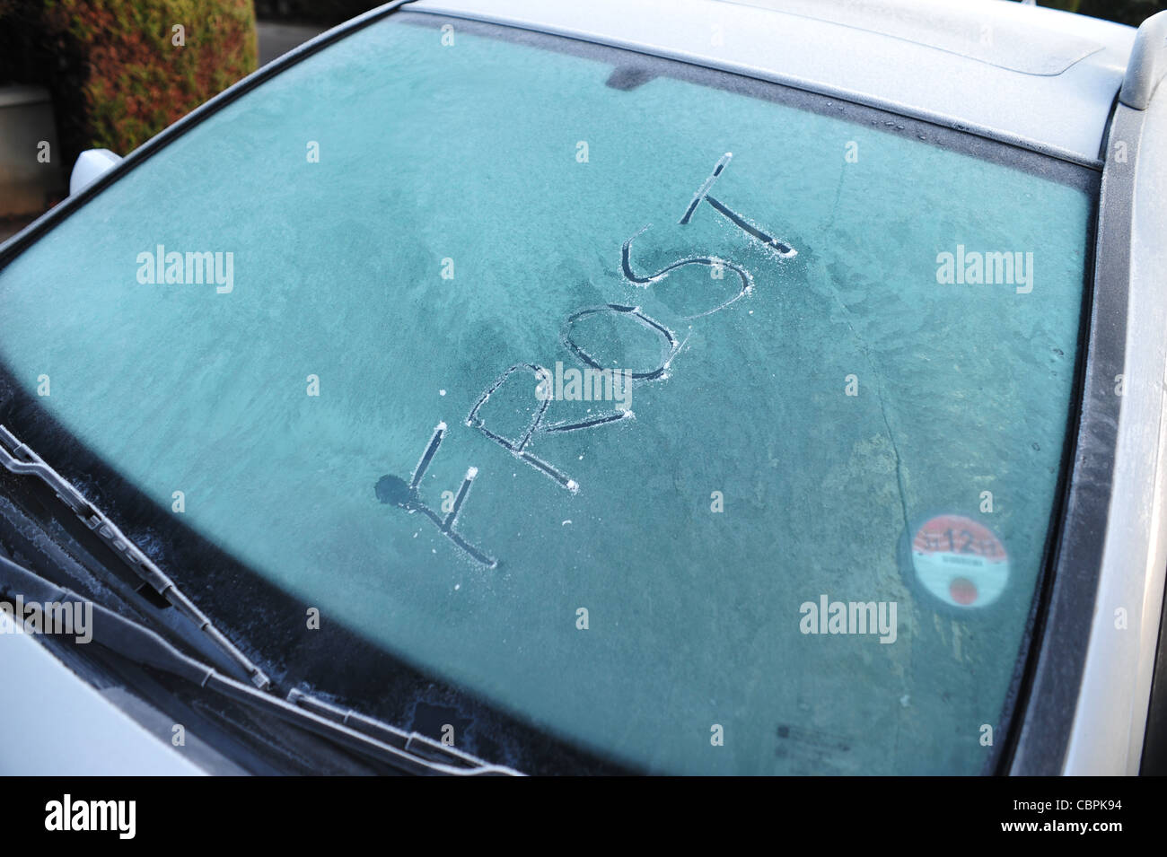 Warning written in frost on car window Stock Photo - Alamy