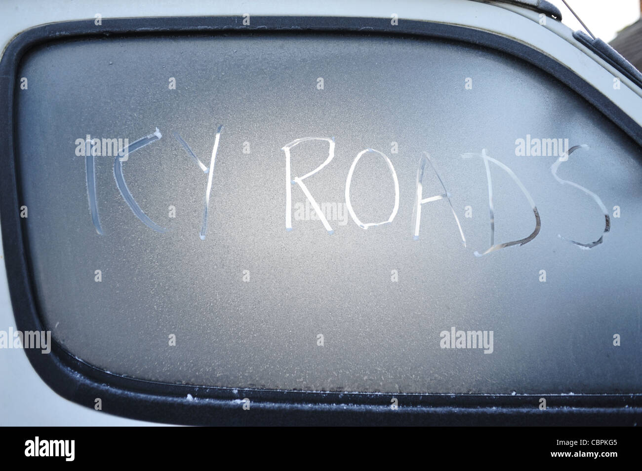 Warning written in frost on car window Stock Photo - Alamy