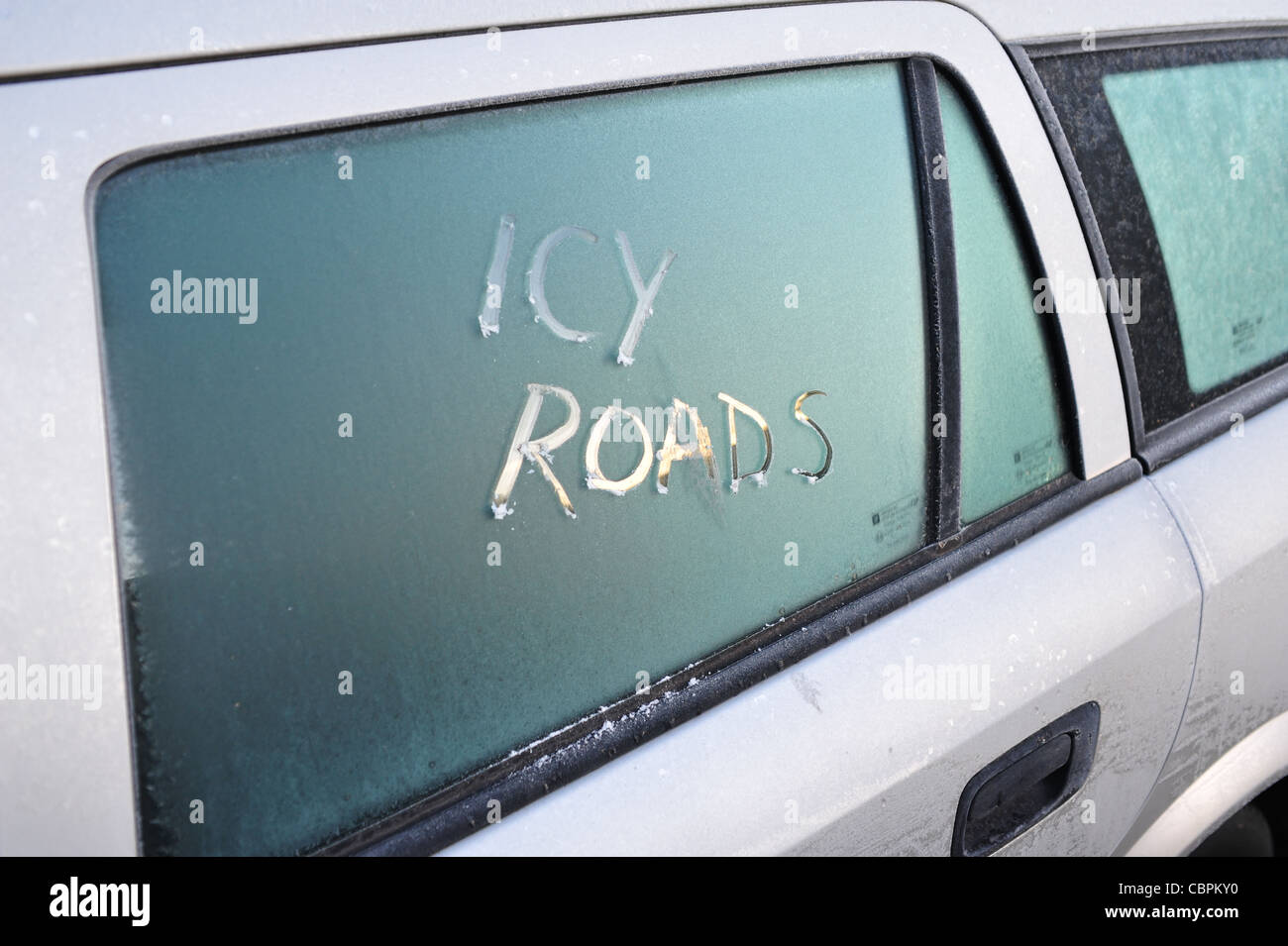 Warning written in frost on car window Stock Photo - Alamy