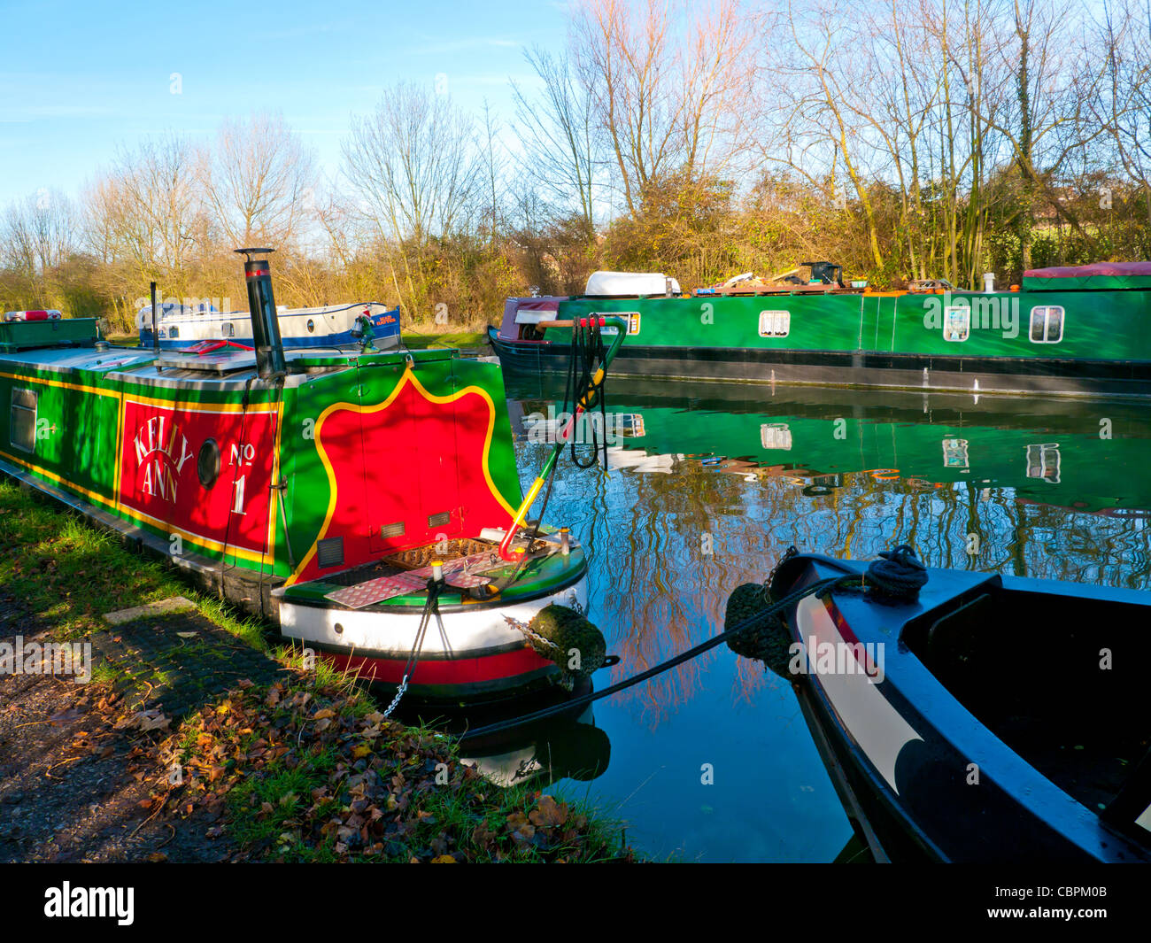 Narrow Red Canal Boats on the Grand Union Canal at Marsworth Lock ...