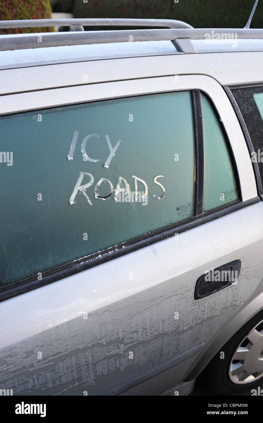 Warning written in frost on car window Stock Photo - Alamy