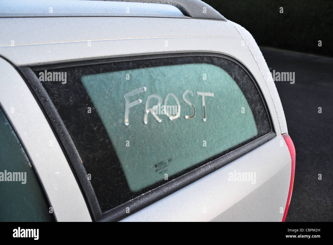 Warning written in frost on car window Stock Photo - Alamy