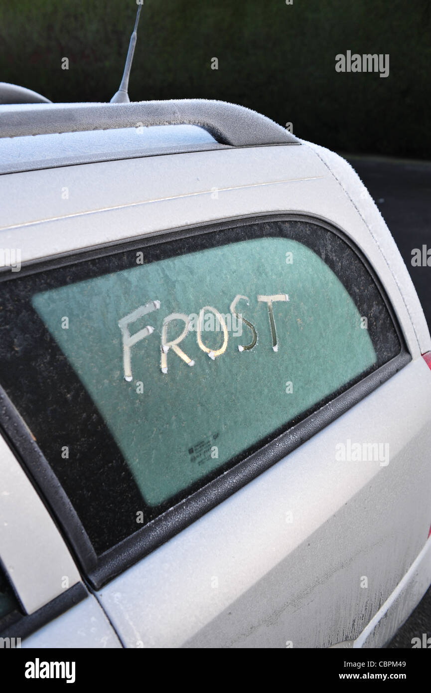 Warning written in frost on car window Stock Photo - Alamy