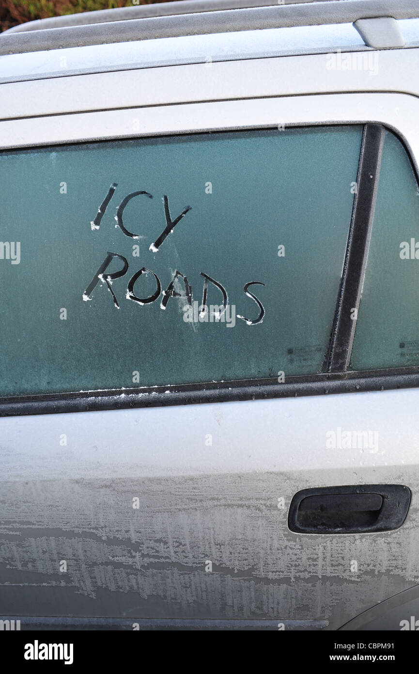 Warning written in frost on car window Stock Photo - Alamy