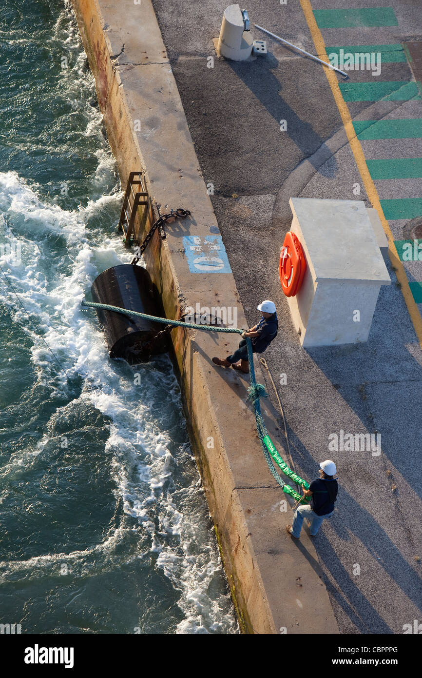 Securing lines (ropes) from a berthing Passenger ship at Toulon France ...