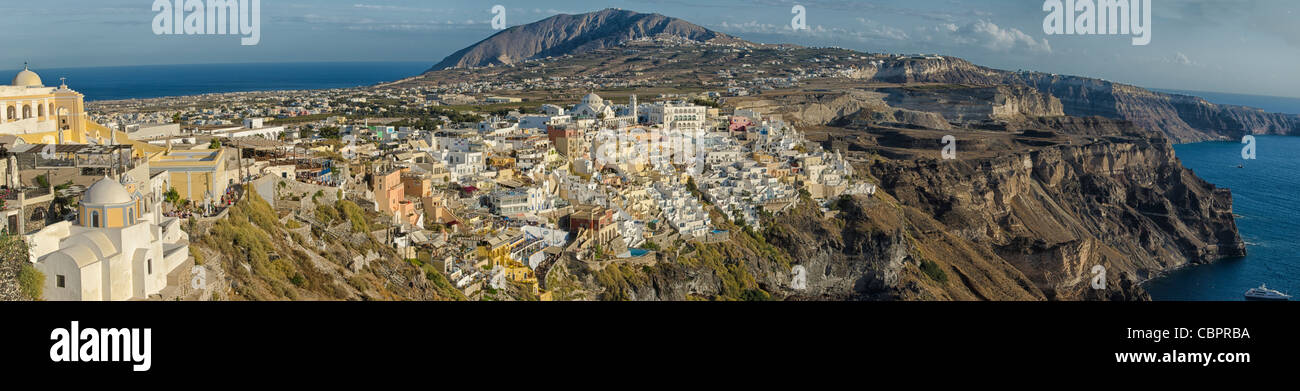 Panoramic city of Fira Santorini Greece at night from mountains with ...