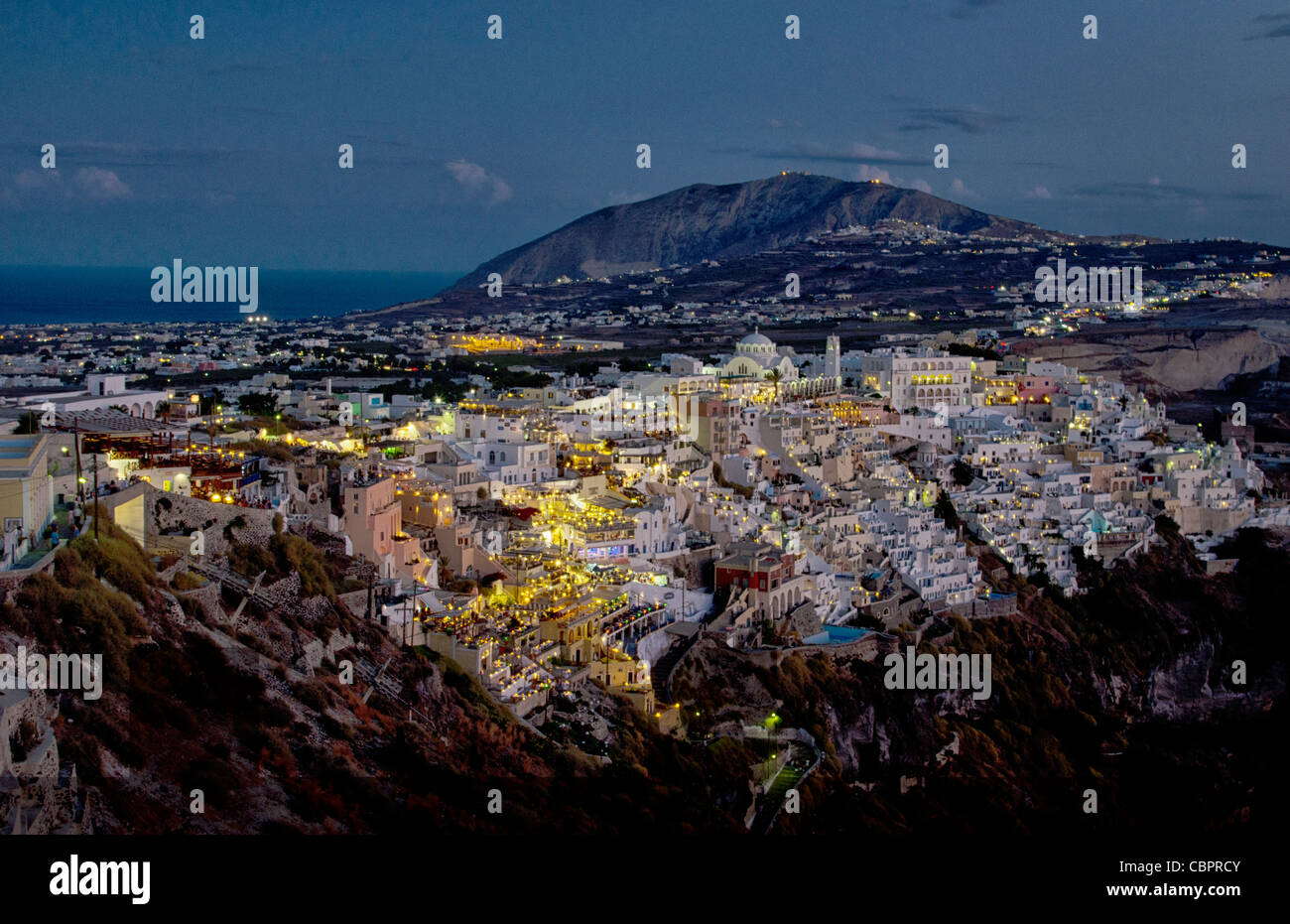 City of Fira Santorini Greece at night from mountains with sky and ...