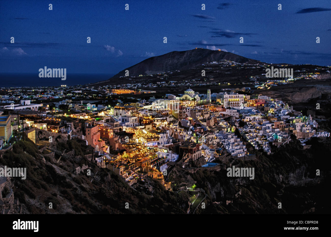 City of Fira Santorini Greece at night from mountains with sky and ...