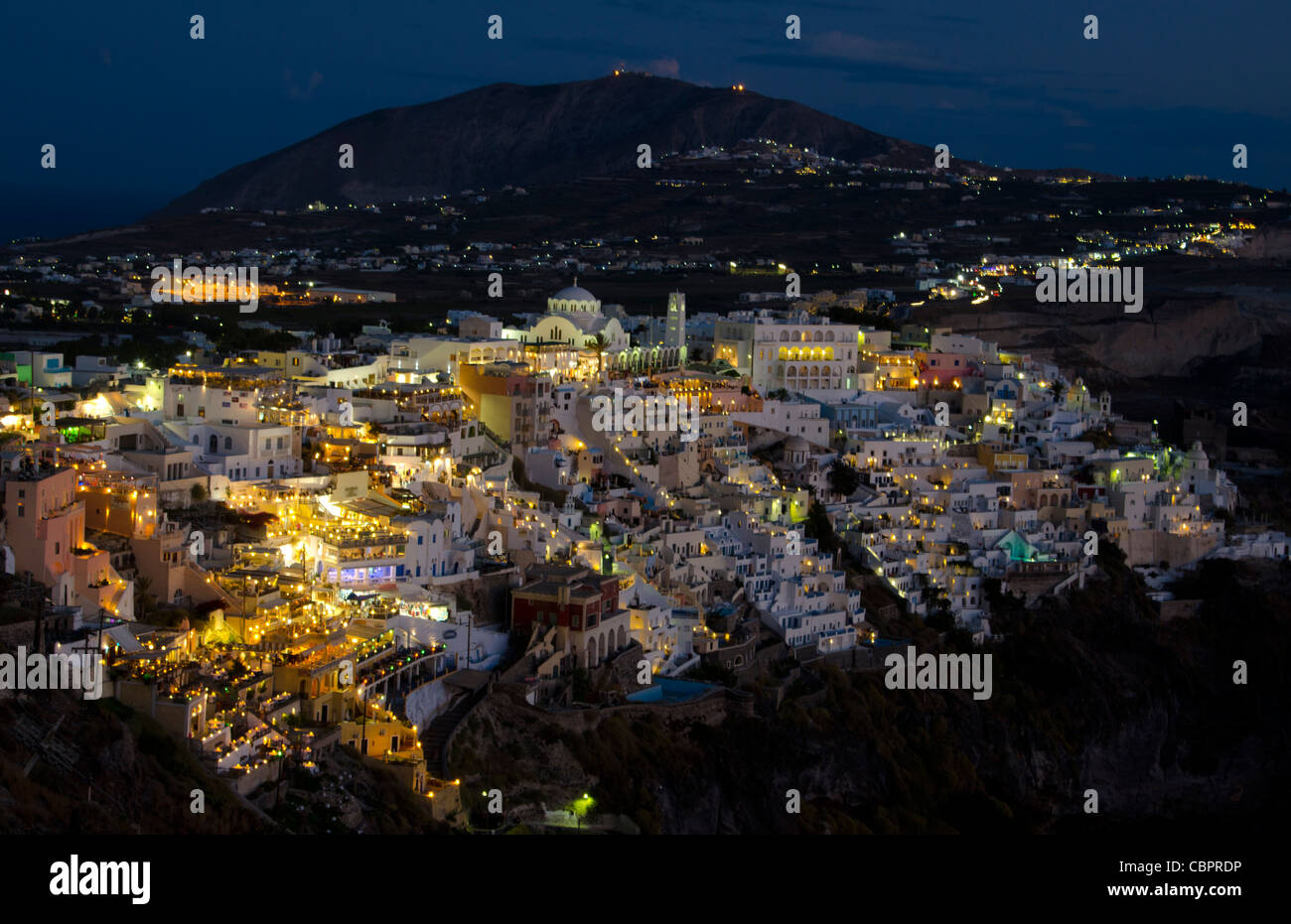 City of Fira Santorini Greece at night from mountains with sky and ...