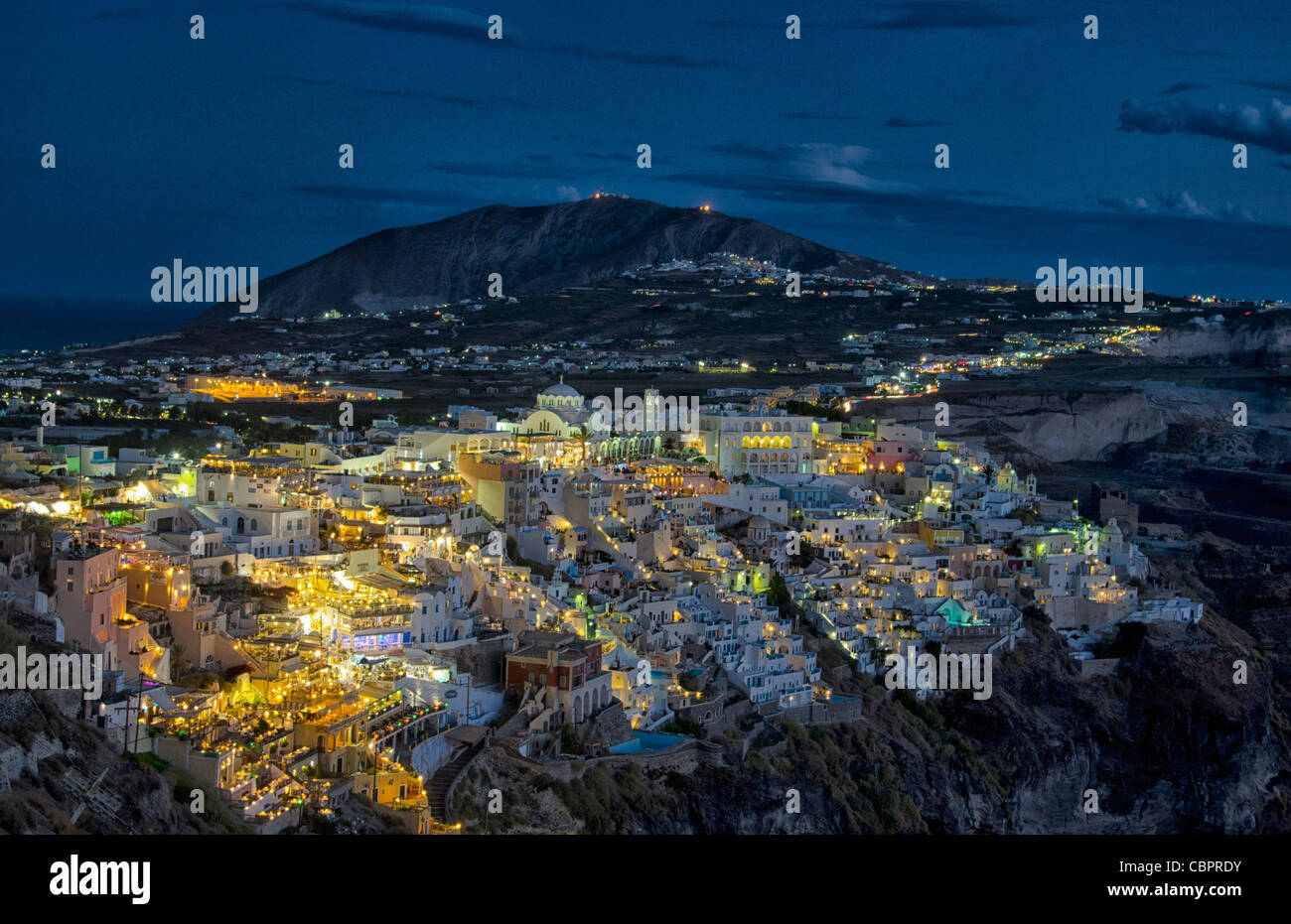 City of Fira Santorini Greece at night from mountains with sky and ...