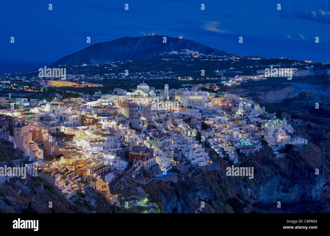City of Fira Santorini Greece at night from mountains with sky and ...