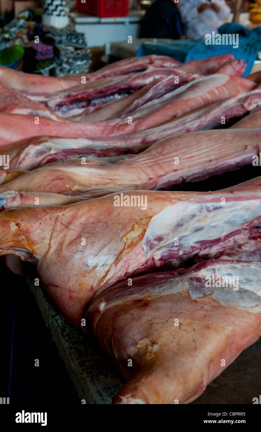 Traditional meat market whole pigs for sale in Cusco Cuzco Peru Stock ...