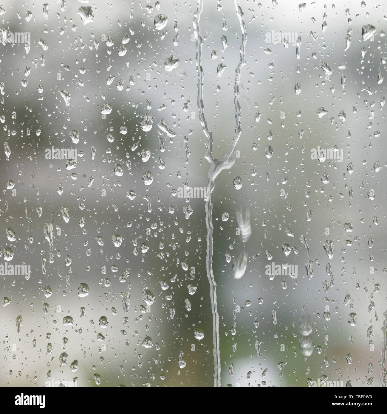 Raindrops flowing on window hi-res stock photography and images - Alamy