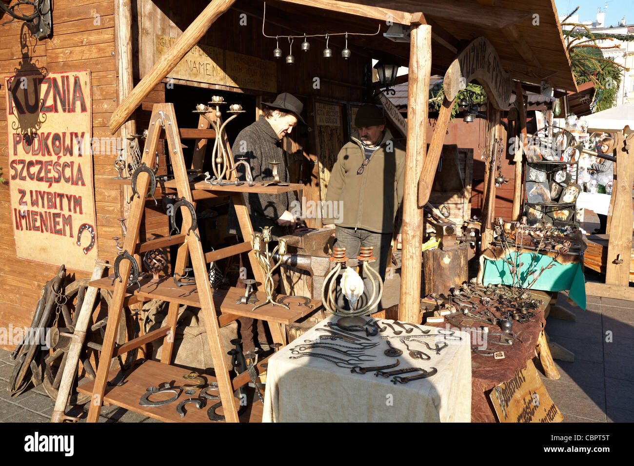 Poland Krakow Christmas Market Blacksmith making and selling wares ...