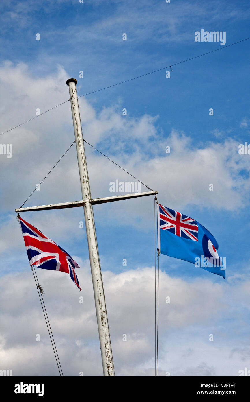 Union Jack and RAF flag being flown on flagpole Stock Photo - Alamy