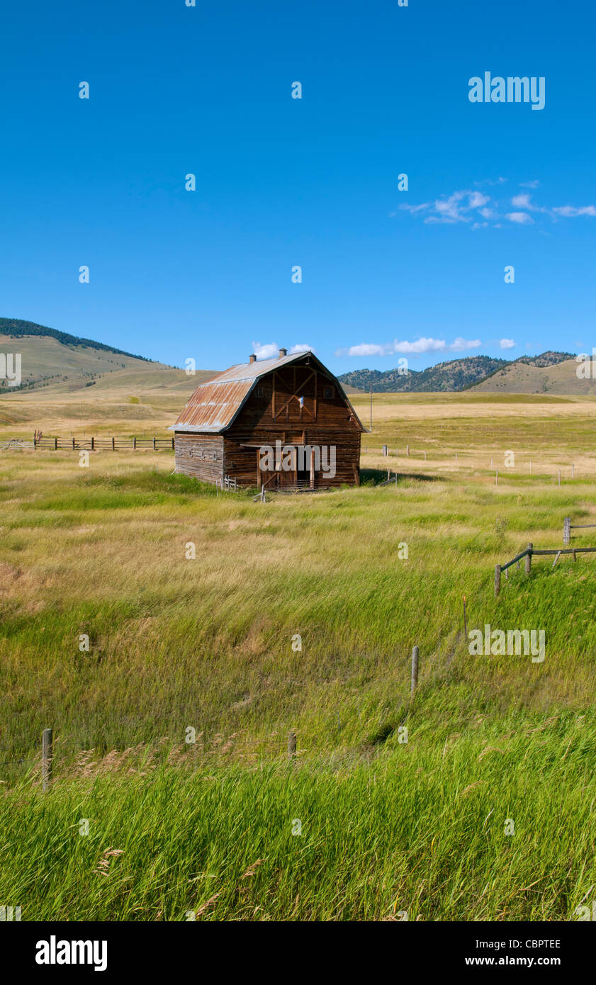 Old barn and field in remote Butte Montana Stock Photo - Alamy