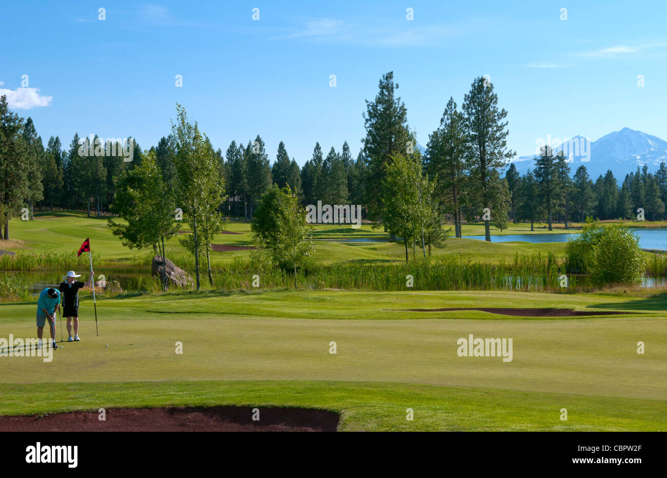 Golfing at Aspen Lakes Golf Course in Sisters Oregon putting at the ...