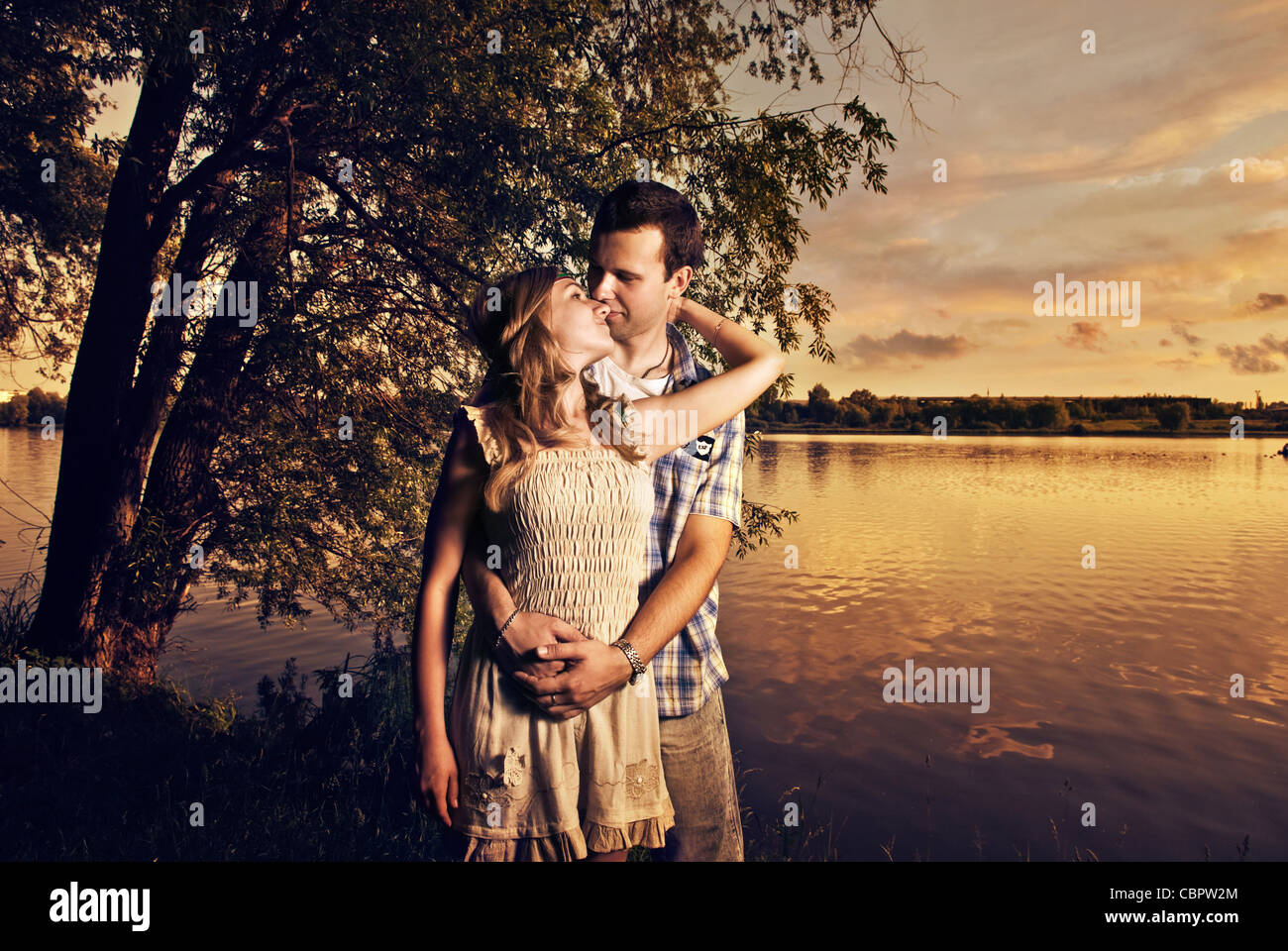 Riverside sunset view Stock Photo - Alamy