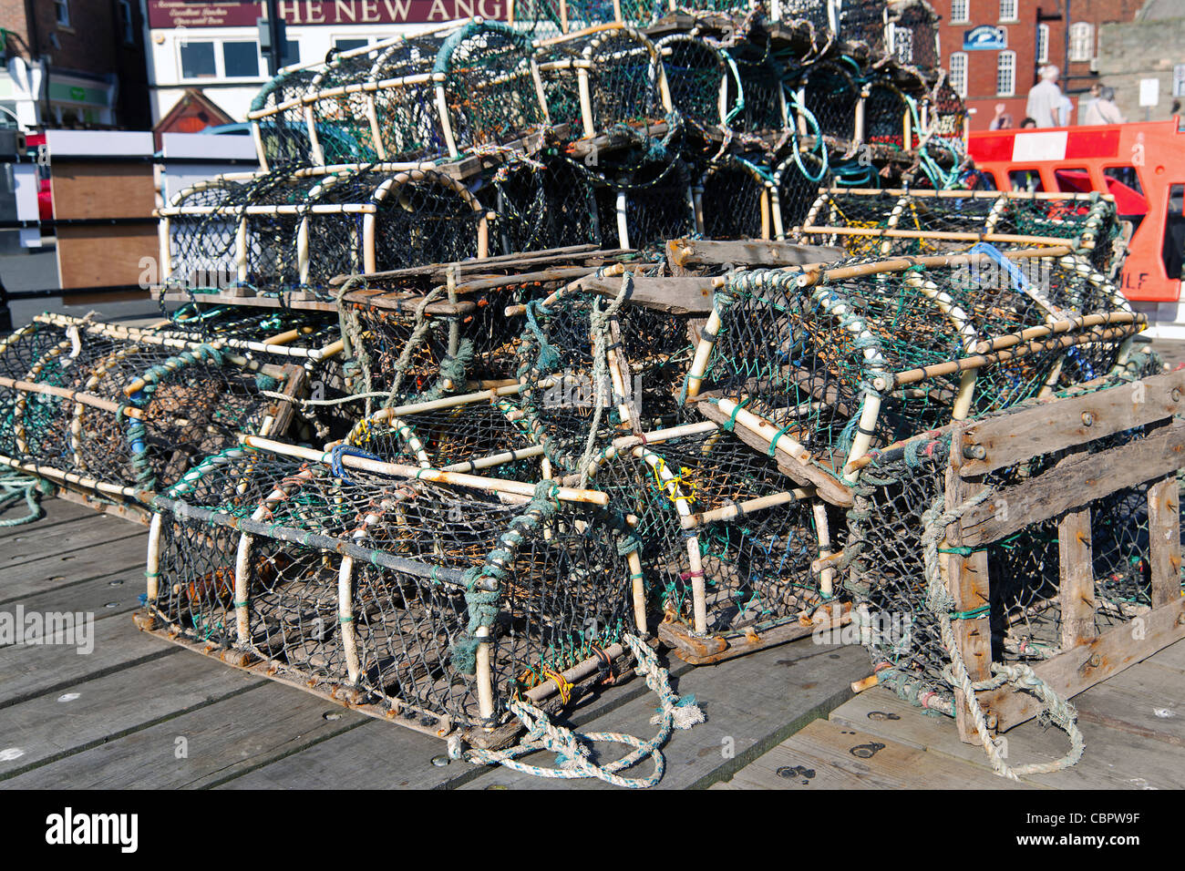 Crab pots stacked on the quayside at Whitby Stock Photo - Alamy